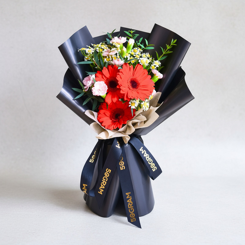 Red Wink Red Daisy Hand Bouquet | 50Gram